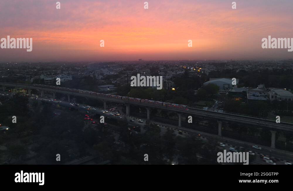 4K Drone Shots of a Sunset in an Indian City New Delhi above trees and ...