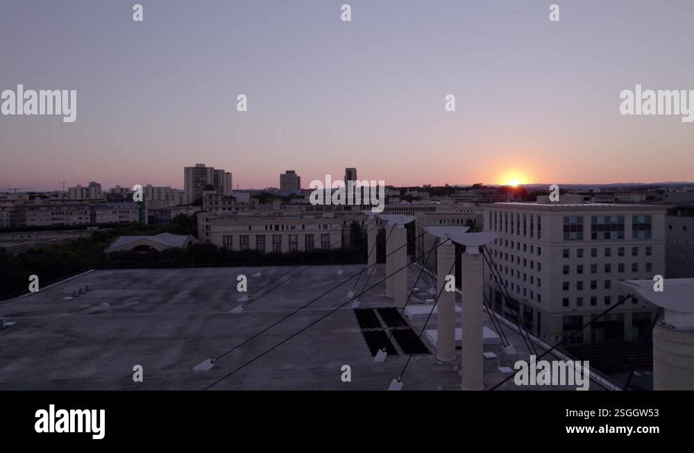 Above the Montpellier rooftops at golden hour sunset Dynamic Aerial ...