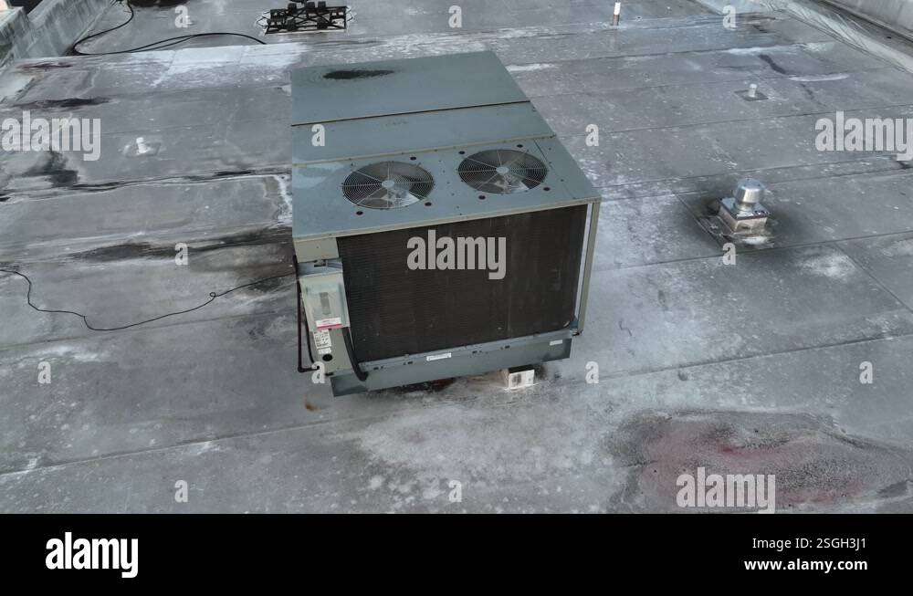 HVAC rooftop system. Heating and cooling air conditioner unit on roof ...