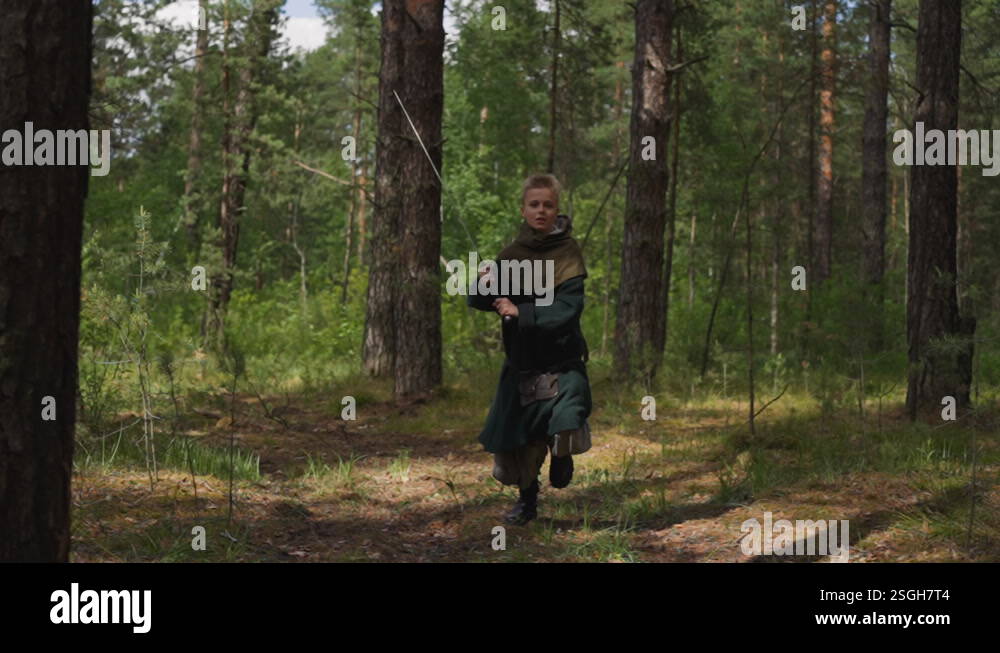 little warrior boy runs with sword to attack Stock Video Footage - Alamy