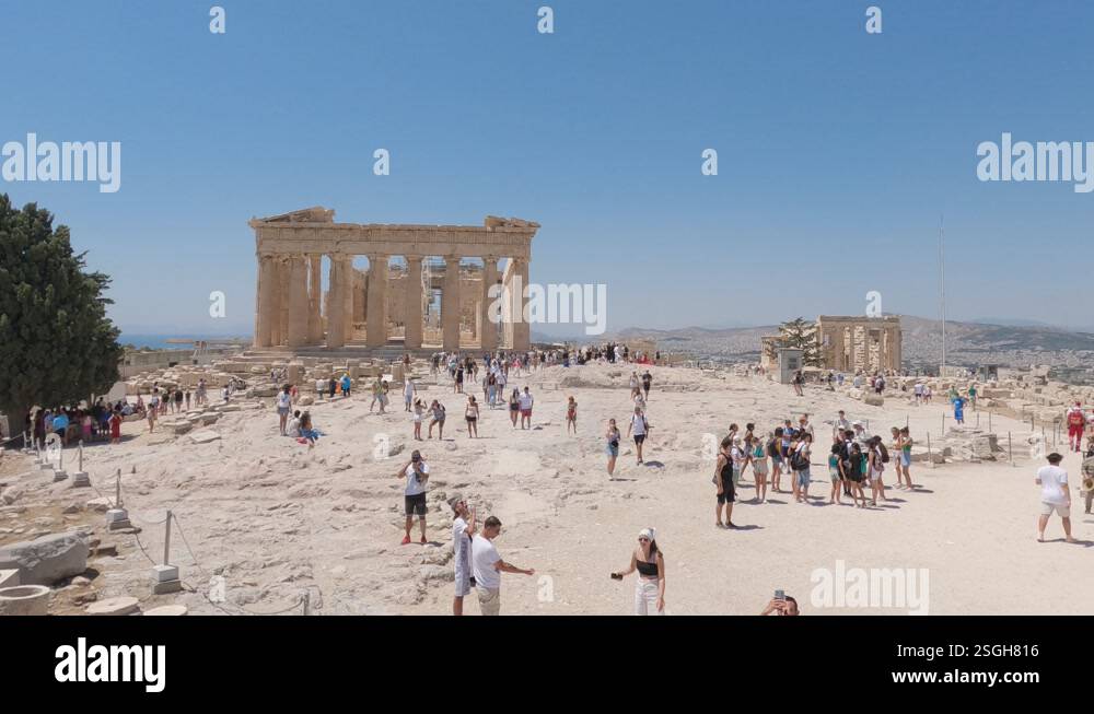 People visit the temple Parthenon of the goddess Athena on the ...
