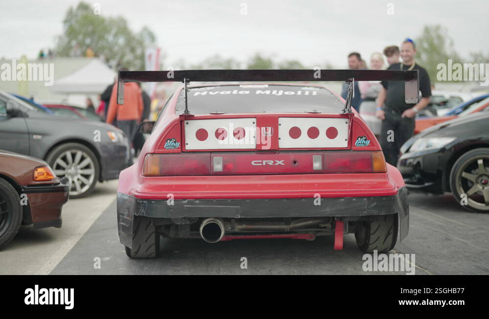 Tuned Honda CRX racing car with big spoiler tracking from rear 4K Stock ...