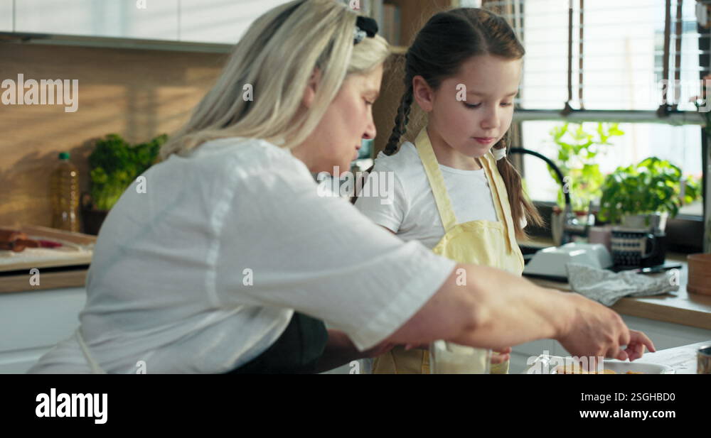 Cooking baking process delighted preschooler daughter granddaughter in ...