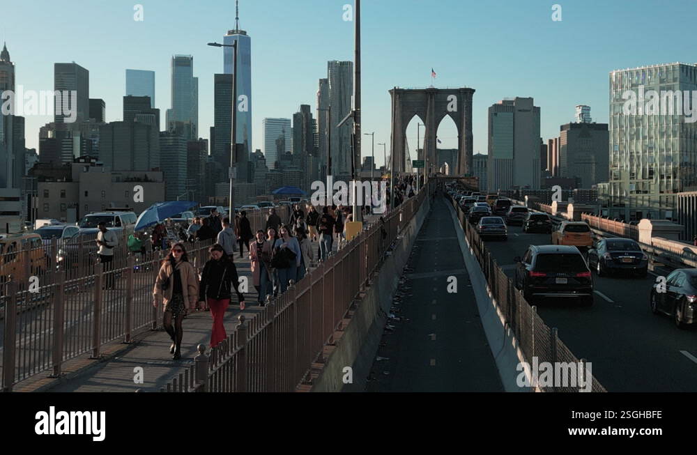 rising view of Brooklyn Bridge pedestrian path and downtown NYC Stock ...