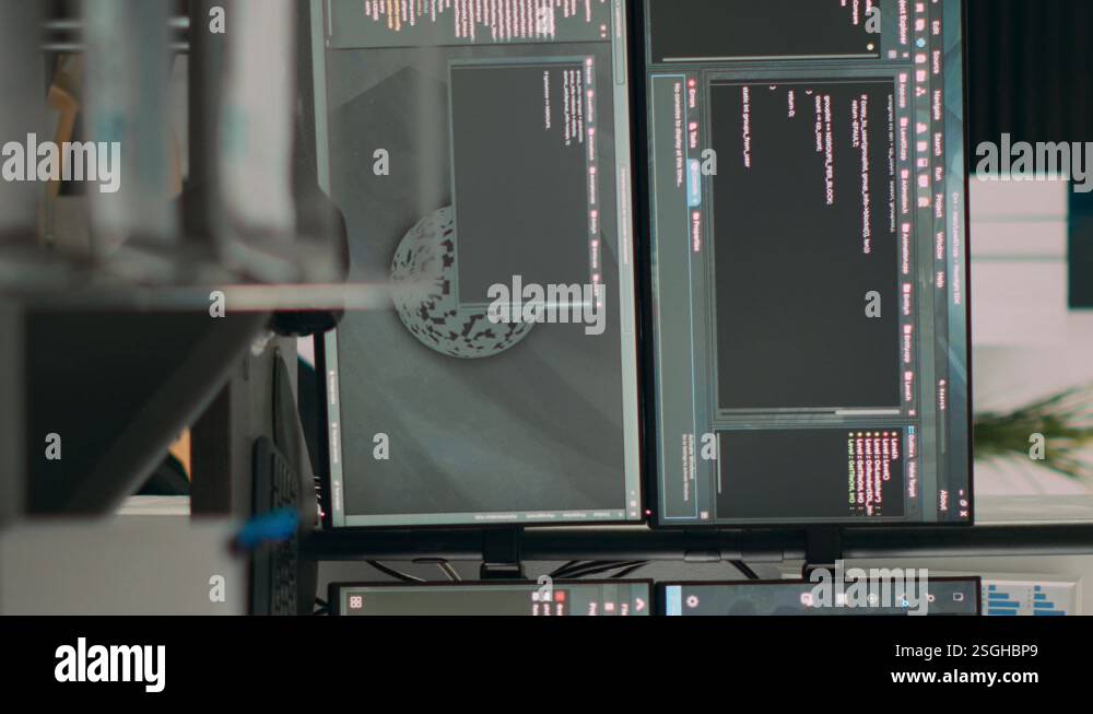 Vertical video: Multiple screens showing programming code in empty ...