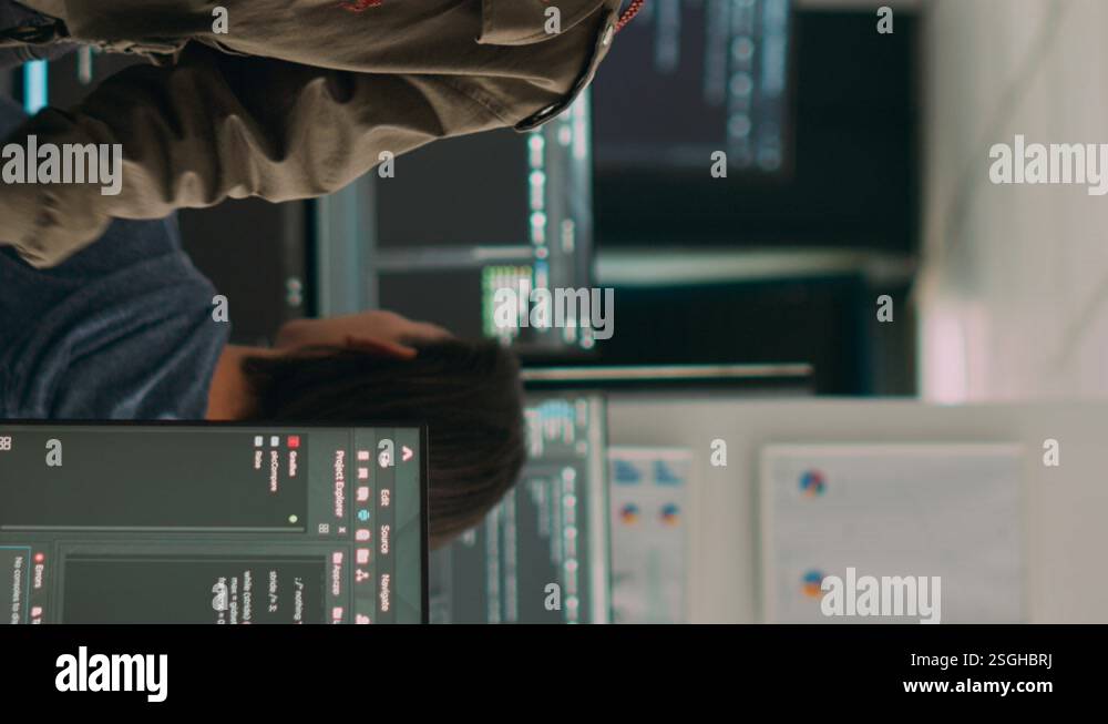 Vertical video: Software engineers analyzing source code and database Stock Video Footage - Alamy