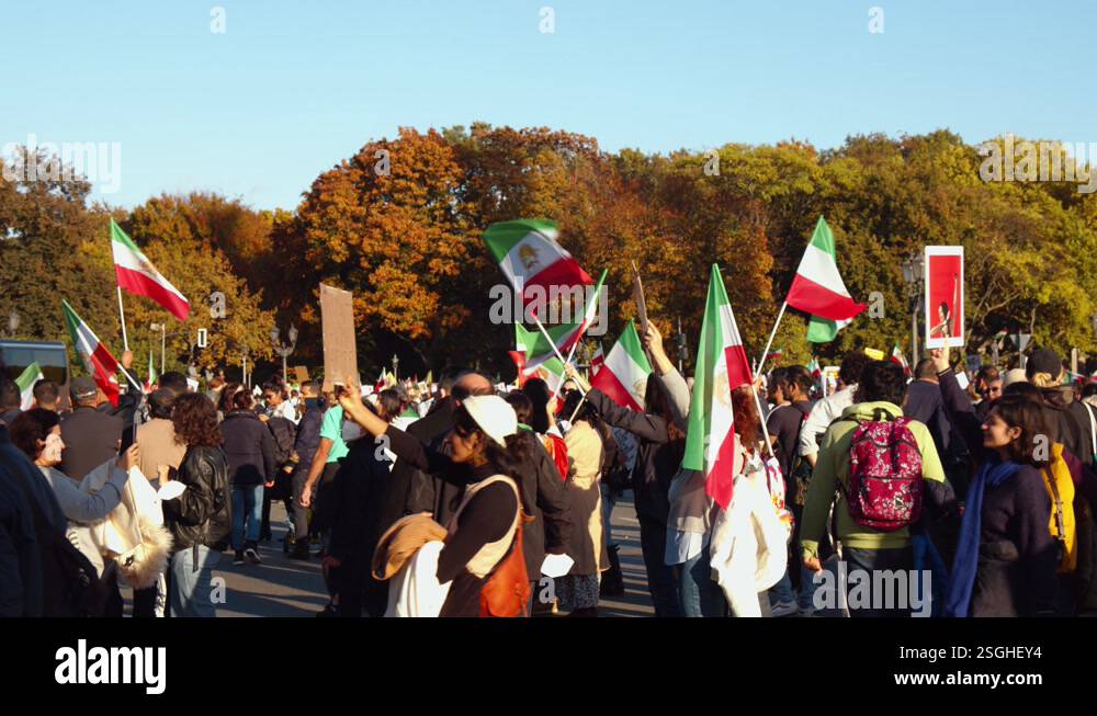 People with Iran flags and banners on huge rally in German capital ...
