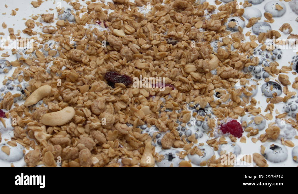 Tasty muesli berry yogurt for breakfast close up. Delicious vegetarian ...