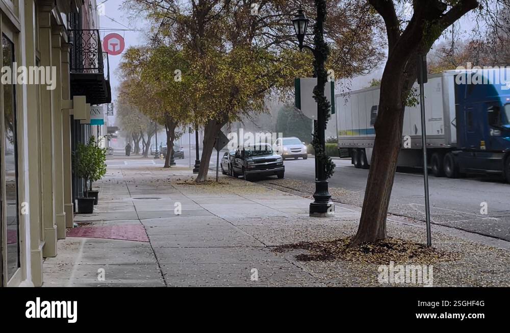 Downtown Augusta Georgia early foggy morning traffic semi truck on ...