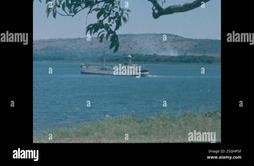 1950s: Steamboat sails on water, seen from shore Stock Video Footage ...