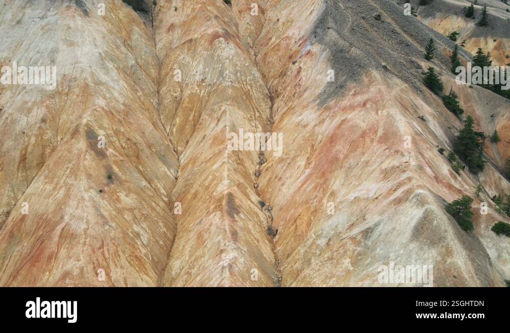 revealing shot of the formed mounds and ridges due to erosion over the ...