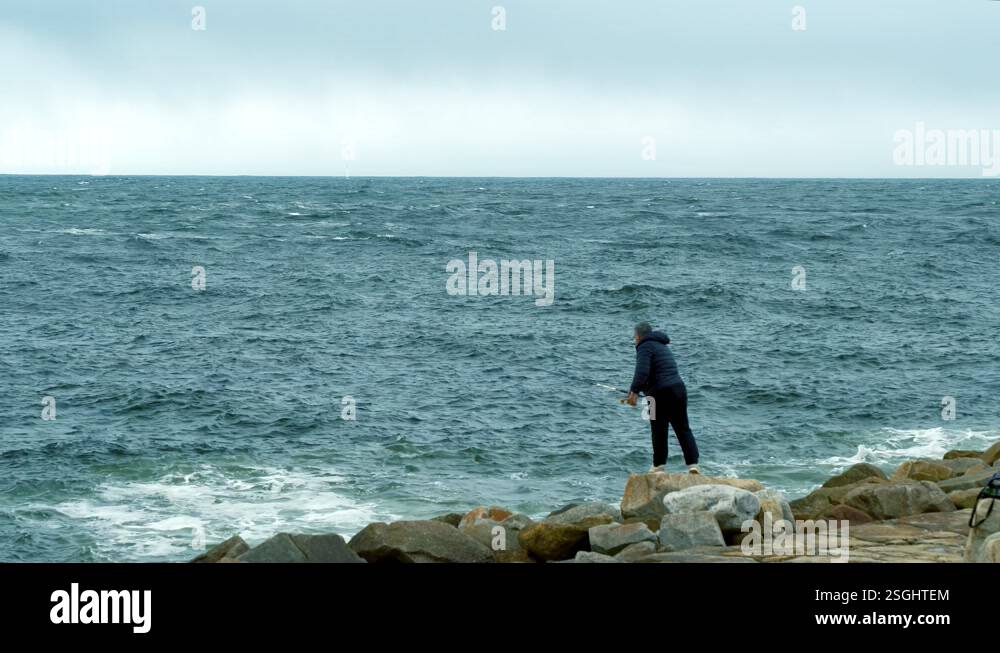 Fisherman fishing porto portugal. blue sea water churned stormy sea ...