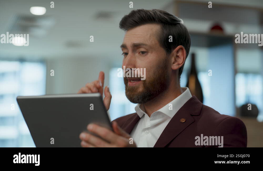 Angry director screaming pad device at coworking. Stressed man arguing ...