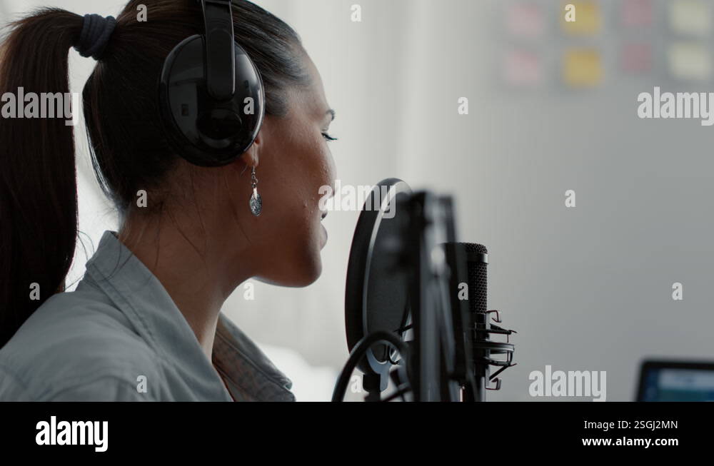 Smiling influencer broadcasting internet talk show while speaking to ...