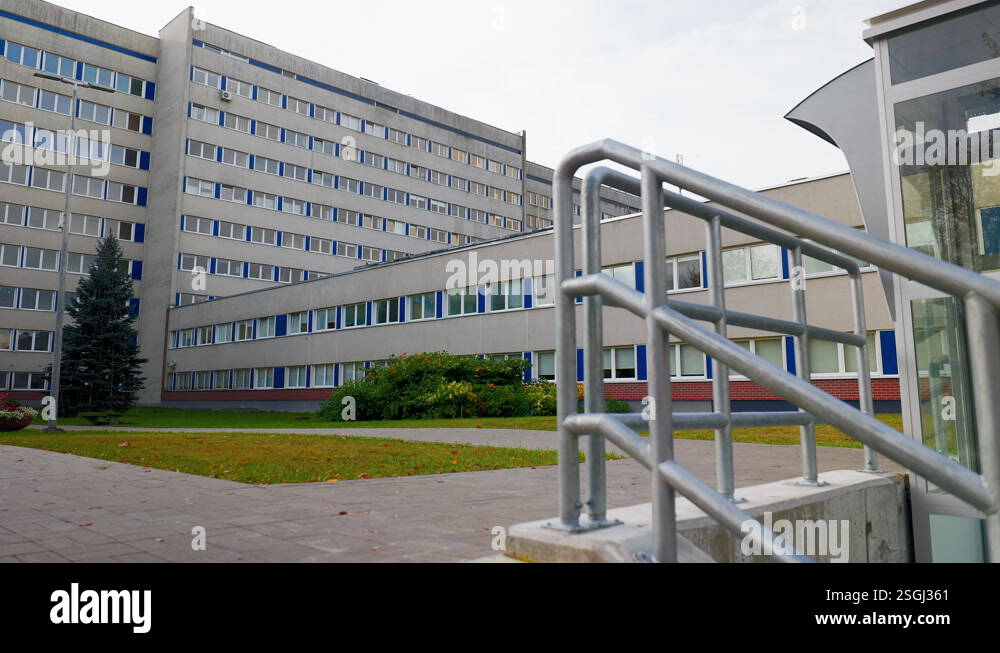 Revealing low angle: Large hospital stationary building during daytime ...