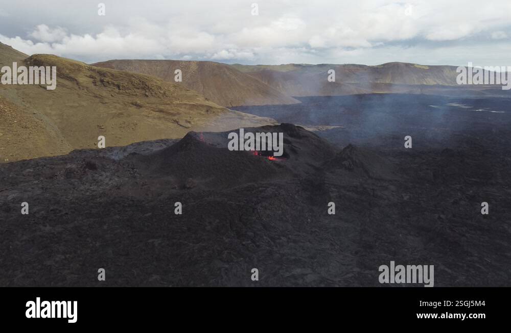 Drone orbit shot of the Fagradalsfjall volcano in eruption in Iceland ...