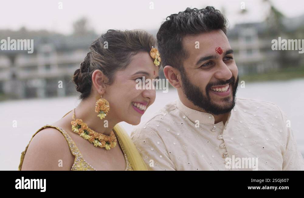 Bride And Groom At Haldi Ceremony For Their Indian Wedding Week ...