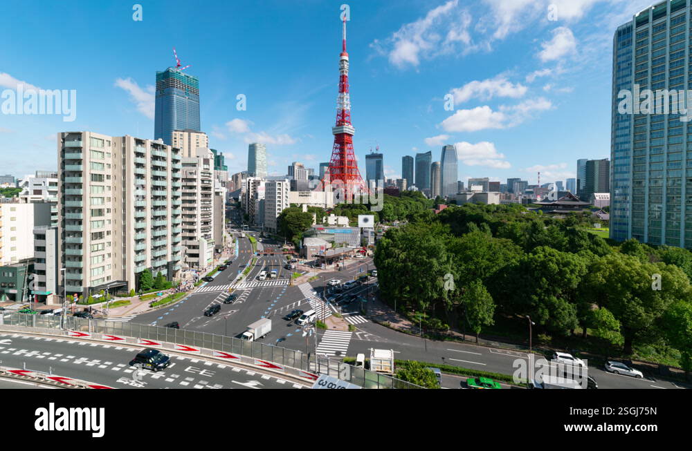 8K Time lapse of Tokyo skyline over busy traffic intersection in Tokyo ...