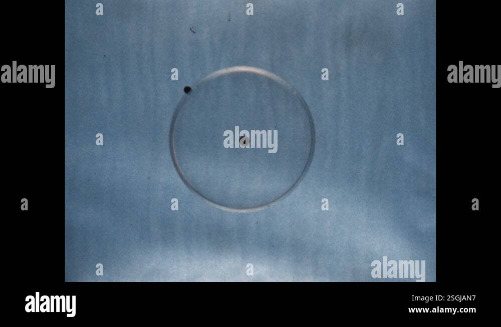 1960s: Example of atom with one electron. Red ball being slowly lit up ...
