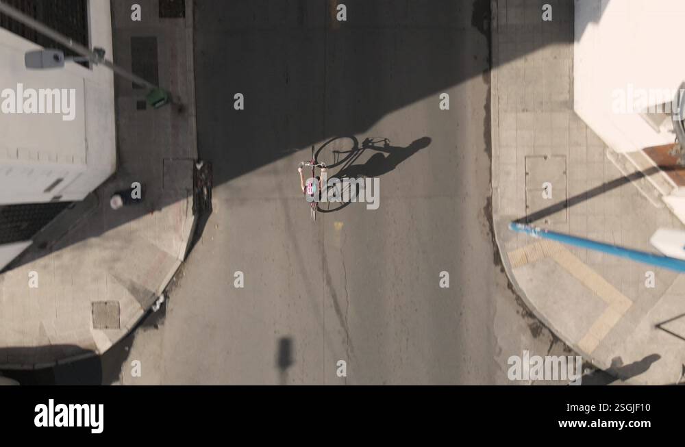Bird eye of girl on bike in Santiago de Chile, uhd 4k aerial Stock ...
