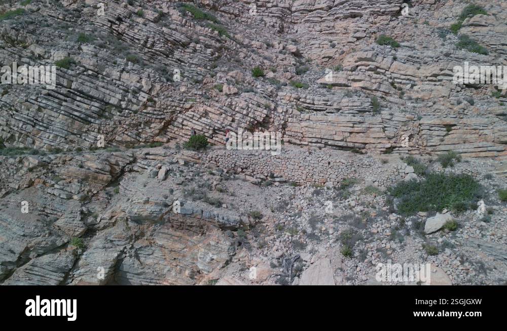 Narrow trail cliff Stock Videos & Footage - HD and 4K Video Clips - Alamy