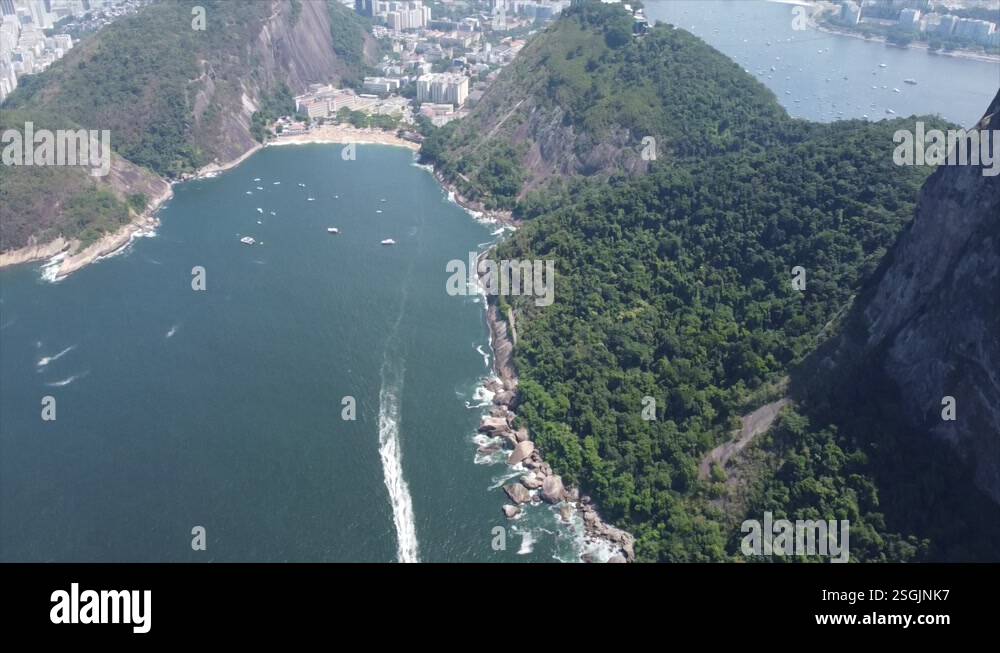 Sugarloaf Mountain View with boats below panning up to entire city of ...