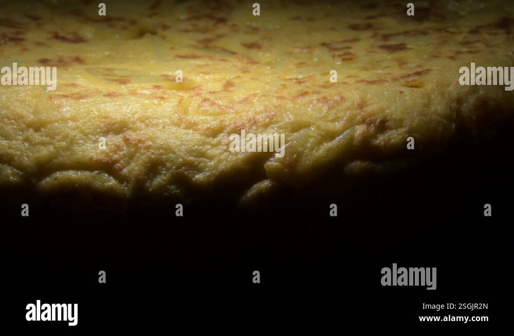 Potato omelette edge turning, Spanish omelette Stock Video Footage - Alamy