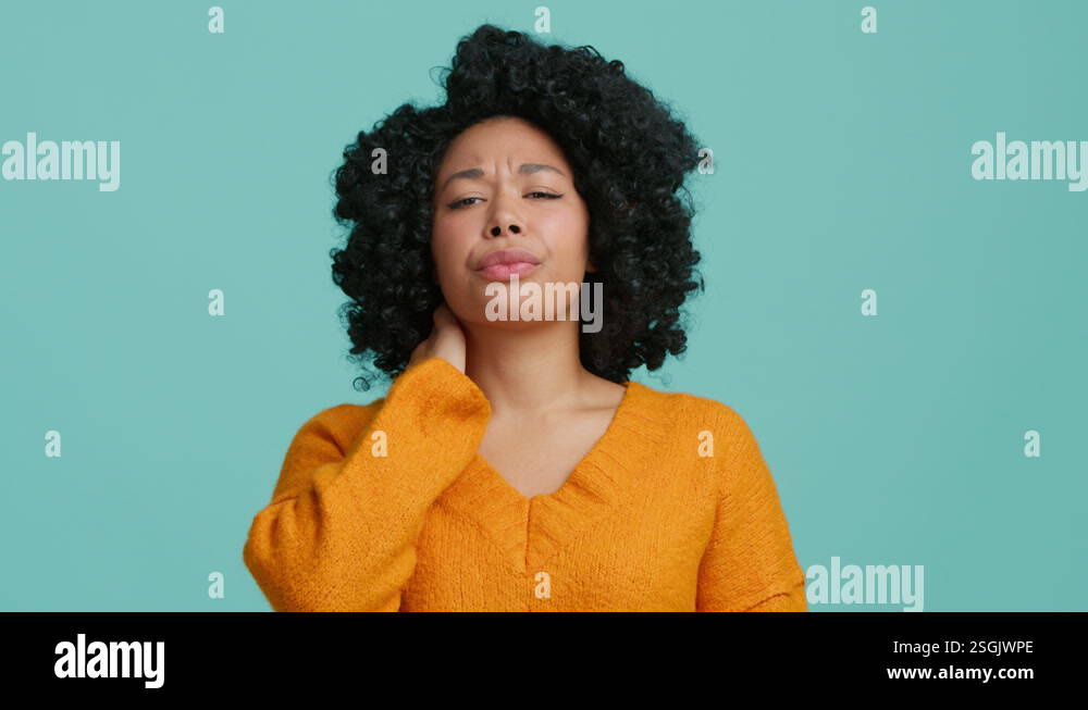 Close up suffering face of African American woman experiences severe ...