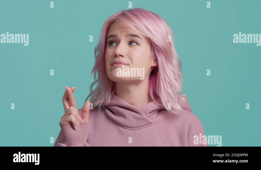 Young pleading cute hipster student girl pastel pink hair keeping ...
