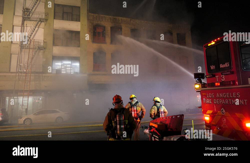 Firefighters spray water Stock Videos & Footage - HD and 4K Video Clips ...
