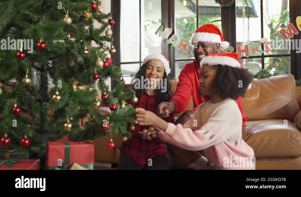 An African American black family, woman, father, mother and kid girl ...