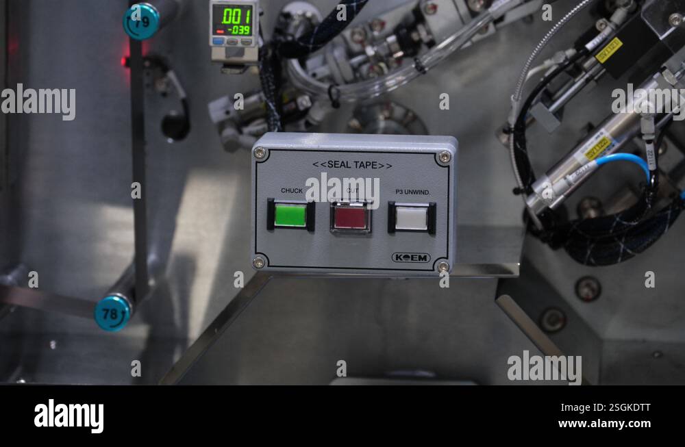 8k Industrial automation panel in a factory with green and red light ...