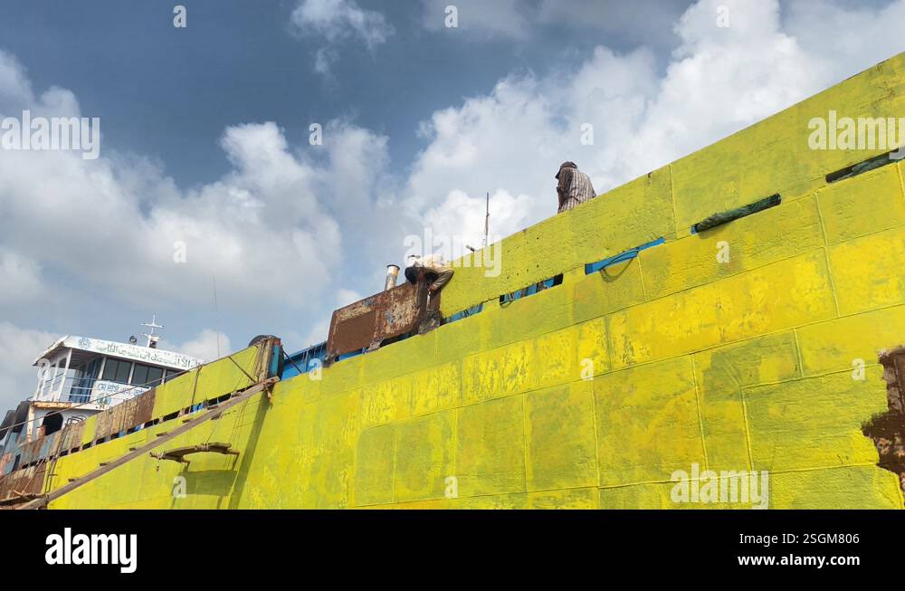 Looking Up At Bangladeshi Dock Workers Leaning Over Side Of Ship With ...