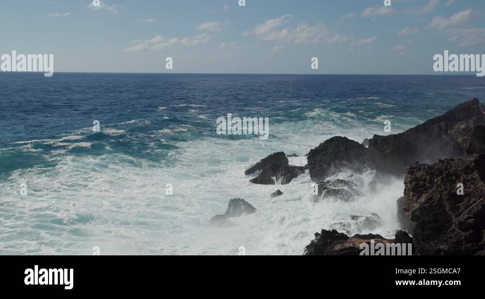 Big sea wave splash on shoal rock Stock Video Footage - Alamy
