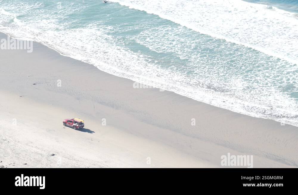 Lifeguard red pickup truck, life guard auto on sand, California ocean ...