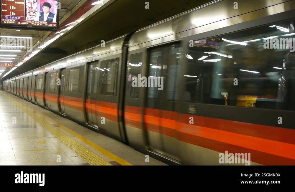 Beijing subway station,busy people crowd inside of train in modern ...