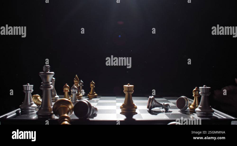 A sore loser smashing the pieces of a chess set Stock Video Footage - Alamy