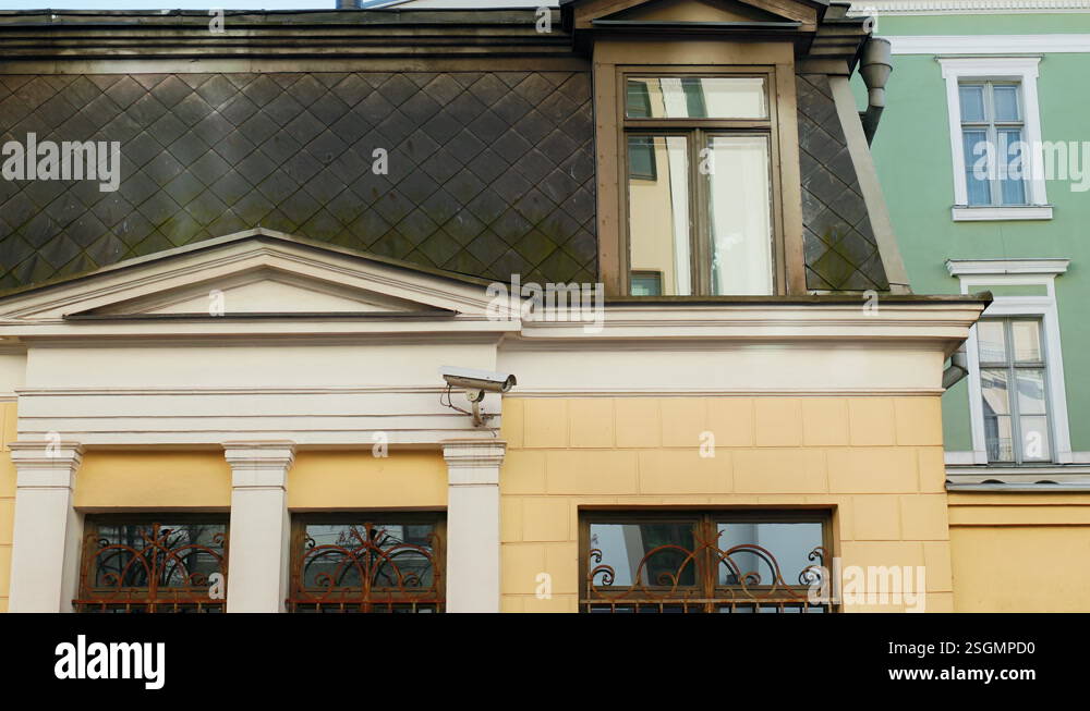 Security CCTV camera is looking for suspicious people on a beutiful old ...