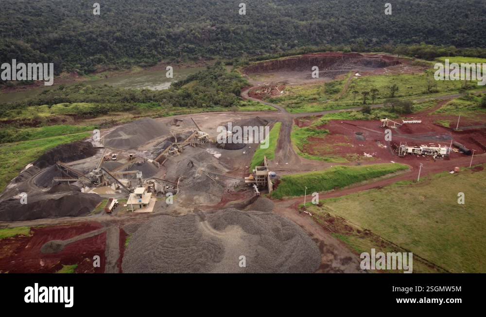 Open stone quarry, Brazil near Iguazu River. Aerial circling Stock ...