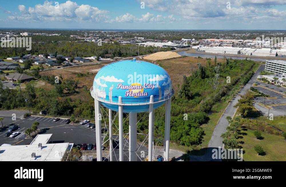 legged water tower in Panama City, Florida circled by drone above tank ...
