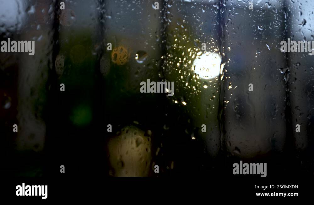 Close Up Moody View Of Rain Droplets On Window Covered With Black Bars ...