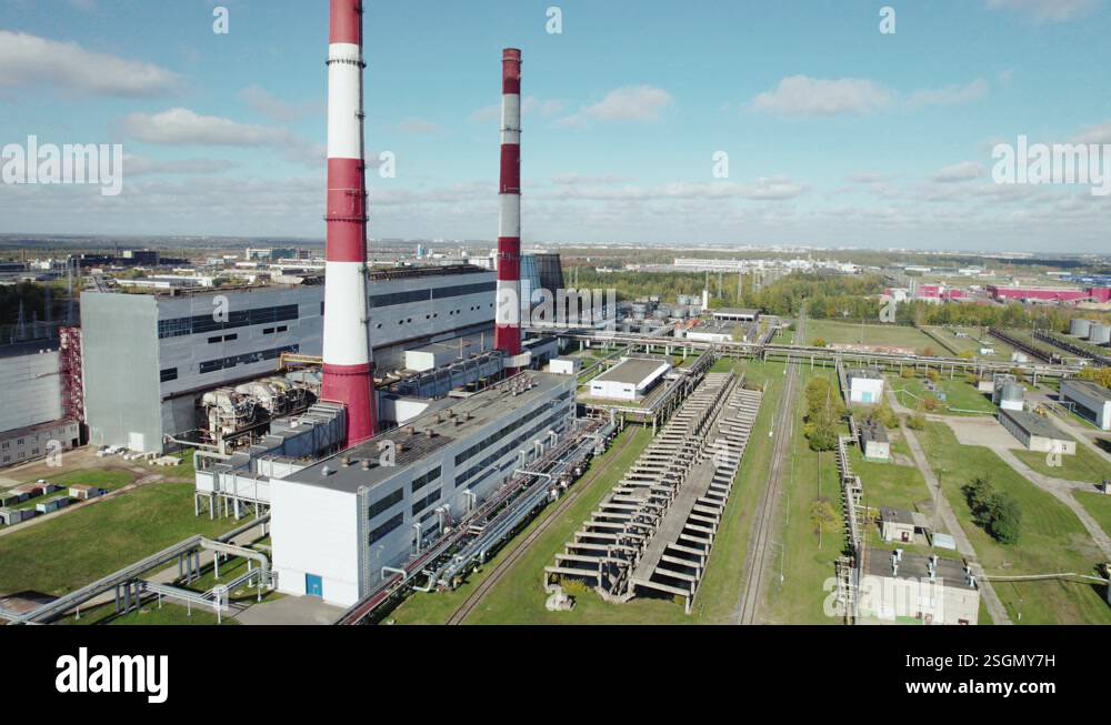 Huge thermal power station, view from height on the buildings and pipes ...