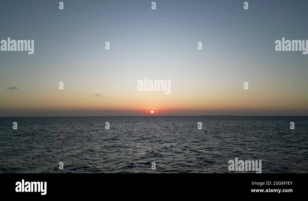 Sunset Indian Ocean horizon at Kusini beach East Zanzibar Island ...