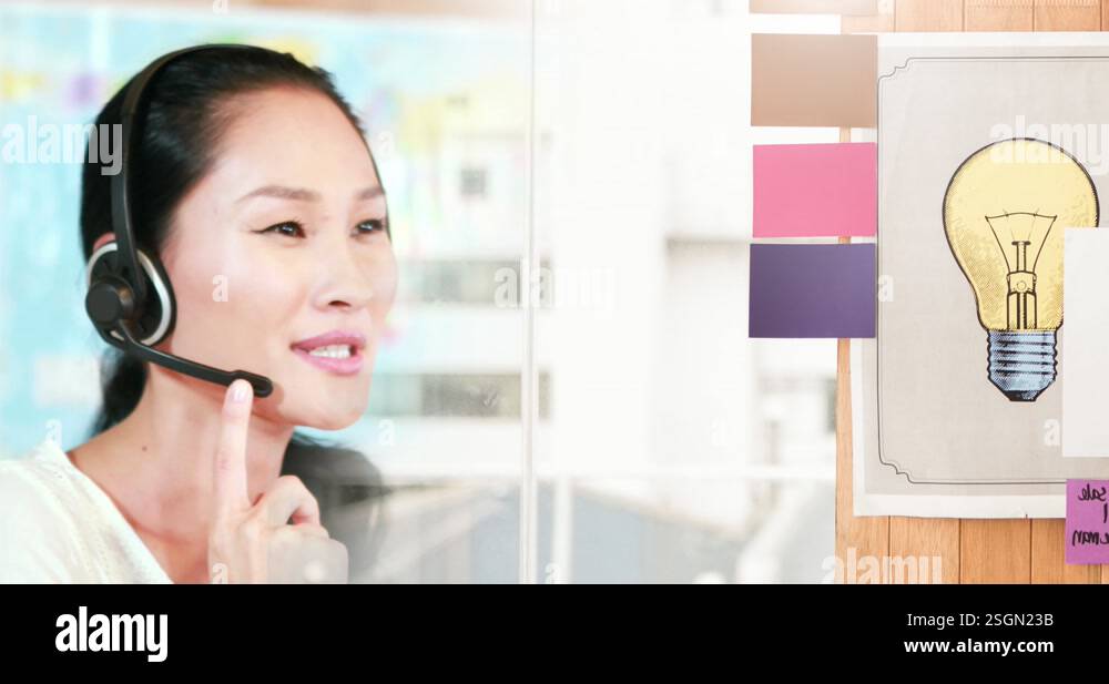 Animation of lightbulb over biracial women using phone headset Stock ...