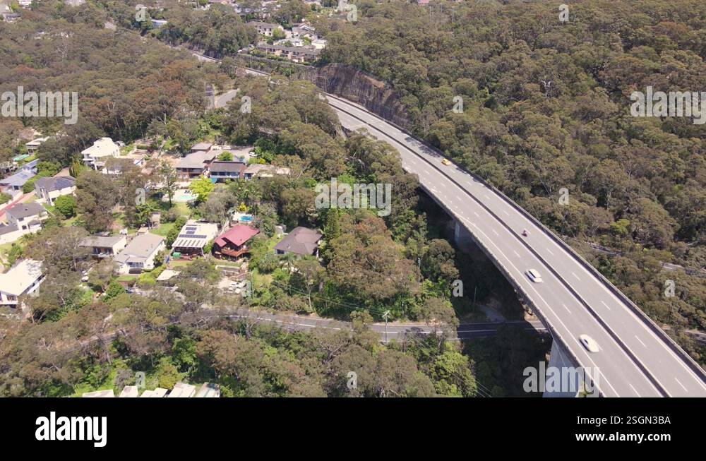 Aerial drone reverse view of Woronora River Bridge in the Sutherland ...