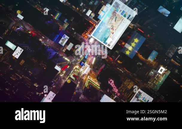 Aerial views of Times Square capture nighttime atmosphere, featuring ...