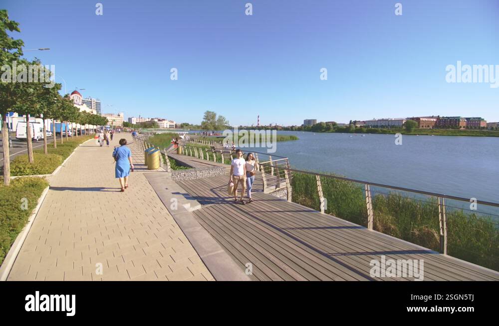 Sidewalk and terrace for people walk on hilly riverbank Stock Video ...