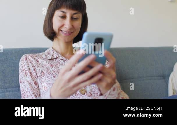 The Girl Smiles When She Receives The Message A Young Girl Is Relaxing