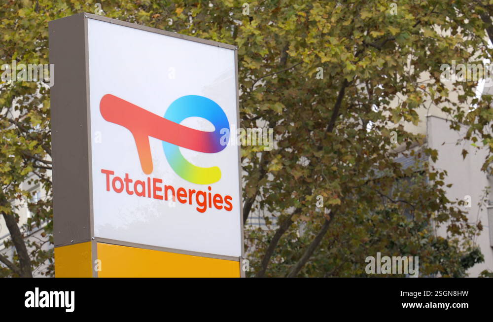 Total Energies logo at the entrance of a gas station in Paris, France ...