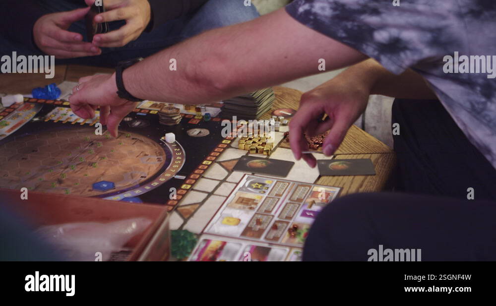 Explaining board game rules by hand pointing on playing plan, detail ...